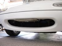 Thompson Automotive disappearing front license plate bracket